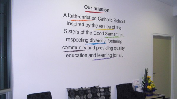 School mission statement wall art in primary school reception area
